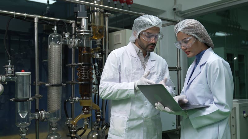 Two Scientist in Professional Uniform Working in Laboratory Stock Image ...