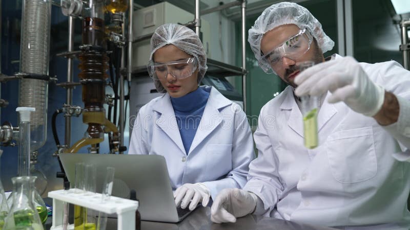 Two Scientist in Professional Uniform Working in Laboratory Stock Image ...