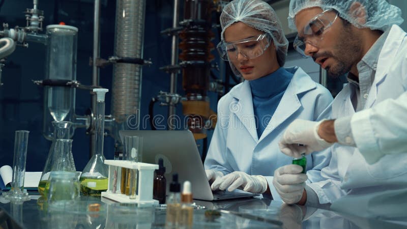 Two Scientist in Professional Uniform Working in Laboratory Stock Image ...