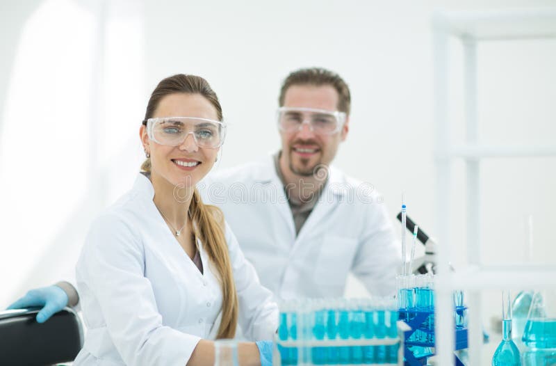 Two Scientists Biologists Sitting in a Laboratory. Stock Photo - Image ...