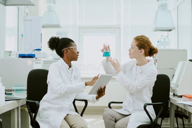 Collaborating on Scientific Research in Modern Laboratory Stock Photo ...