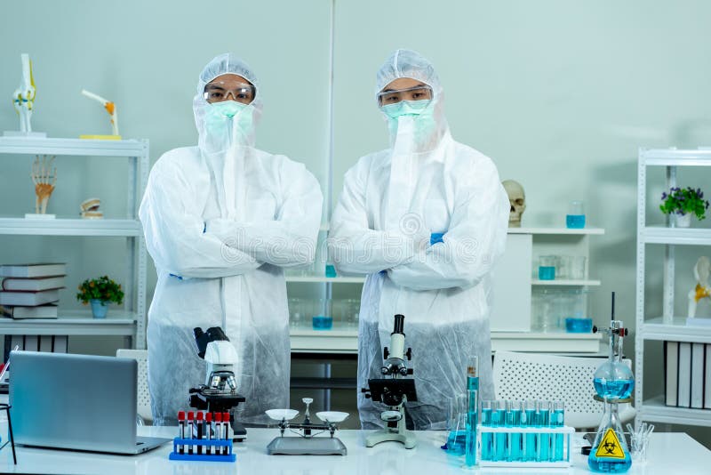 Two Scientists Testing Blood Sample from Test Tube Galssware with ...