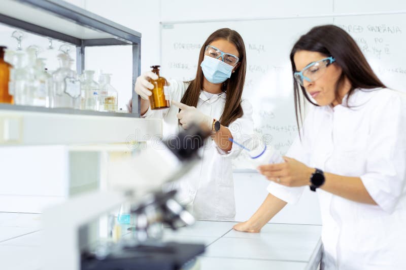 Scientists Working in Modern Laboratory with Equipment Stock Photo ...