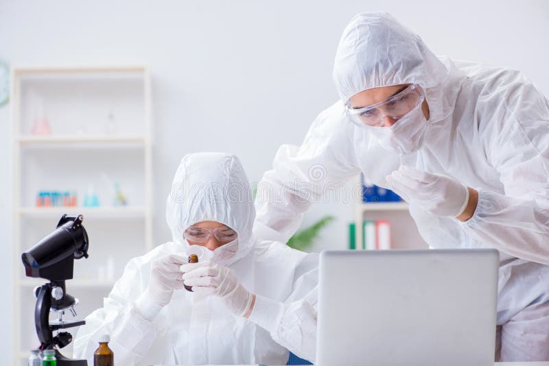 The Two Scientists Working in the Chemical Lab Stock Photo - Image of ...