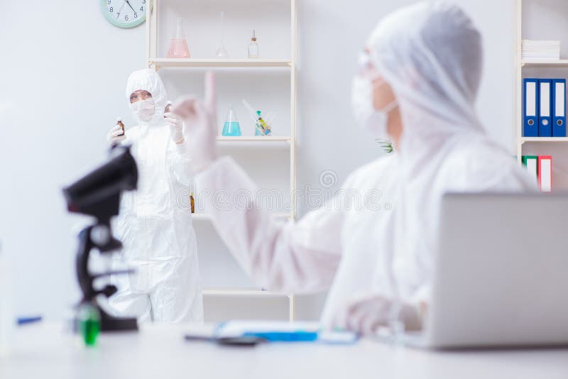 The Two Scientists Working in the Chemical Lab Stock Photo - Image of ...