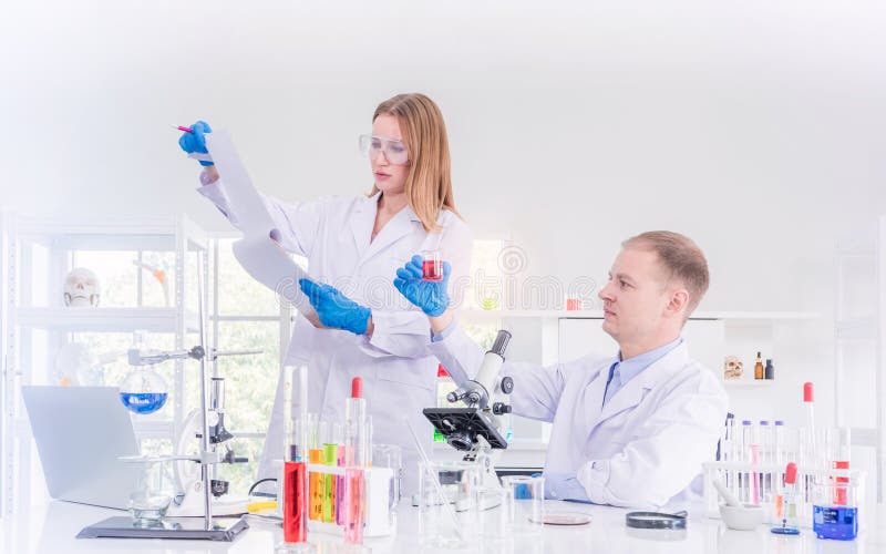Two Scientists Working in Chemical Laboratory Stock Photo - Image of ...