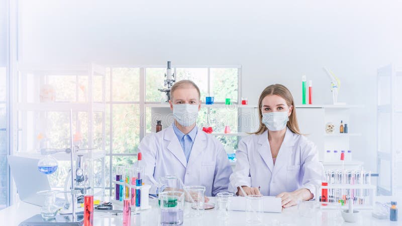 Two Scientists Working in Chemical Laboratory Stock Image - Image of ... Two Scientists Working in Chemical Laboratory Stock Image - Image of ...