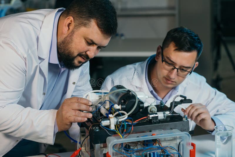 Two Scientists are Working on the Development of a New Device Stock ...