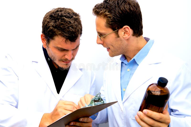 Two Scientists Working Together Stock Photo - Image of microbiology ...