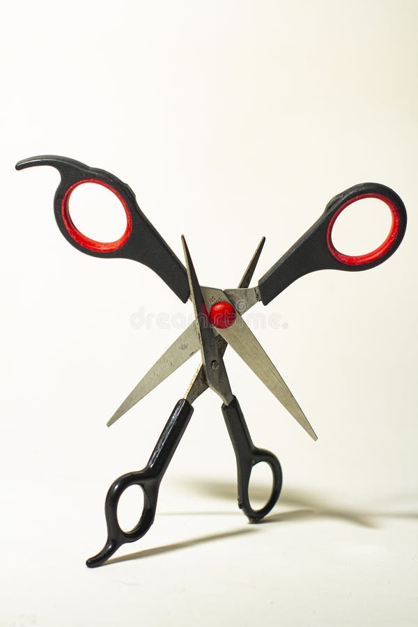 Two Scissors in Interesting Positions Producing a Spectacular Shadow ...