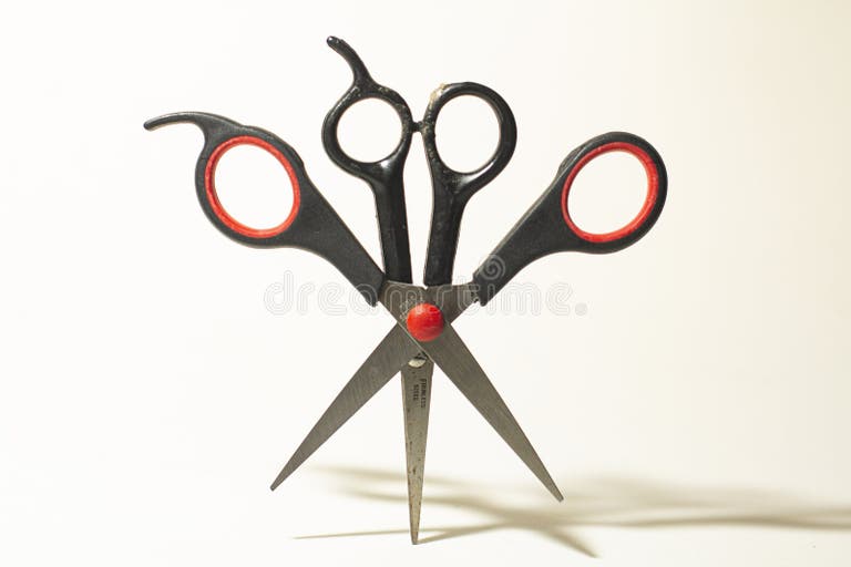 Two Scissors in Interesting Positions Producing a Spectacular Shadow ...