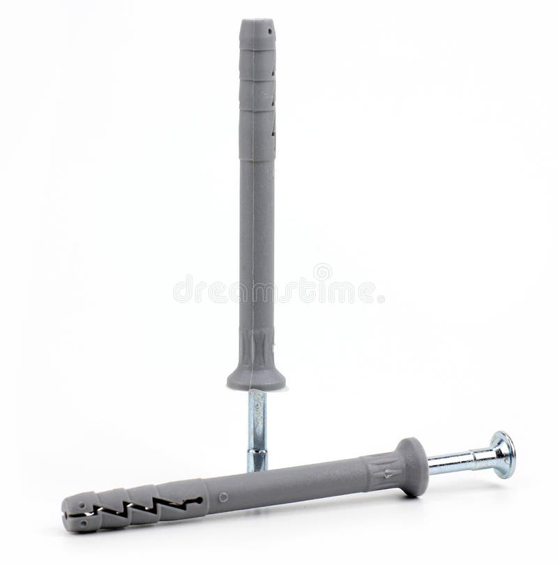 Two screws with wall plugs stock photo. Image of dowel - 45001106