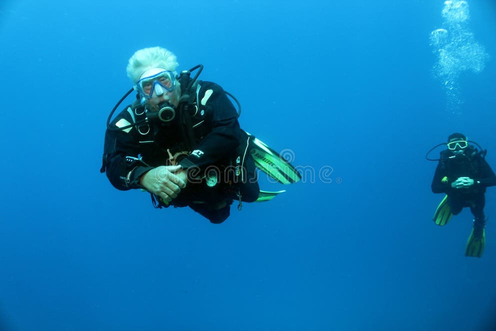 Two Scuba Divers Mid Water. Editorial Photo - Image of common, sport ...