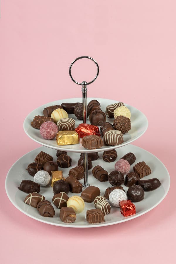 Two Section Cake Stand with Chocolate Candies. Two Tier Plate Stock ...