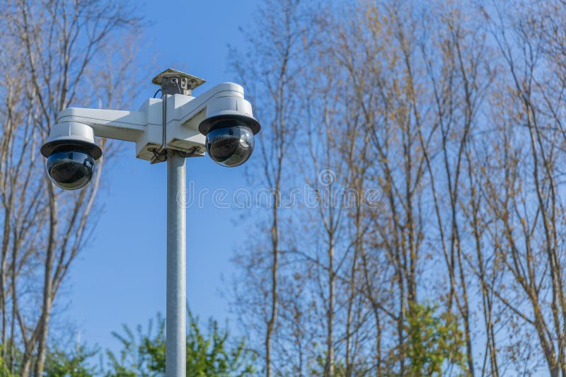Two Security Cameras are Mounted on a Pole. Stock Photo - Image of ...
