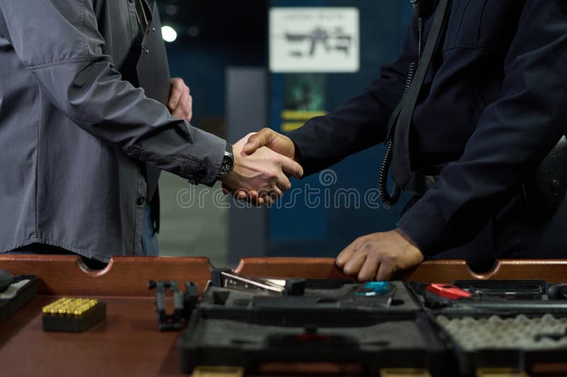 Handshake between Security Professionals in Office Setting Stock Image ...