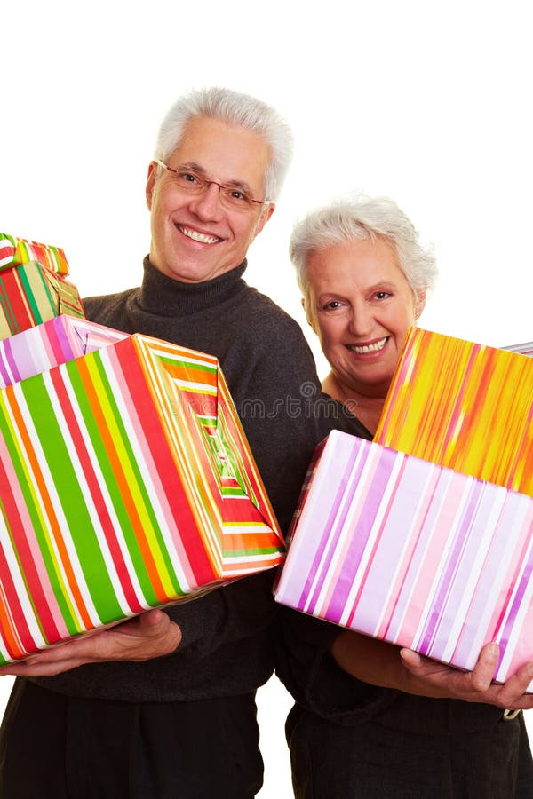 Two Senior Citizens with Gifts Stock Image - Image of presents, retiree ...