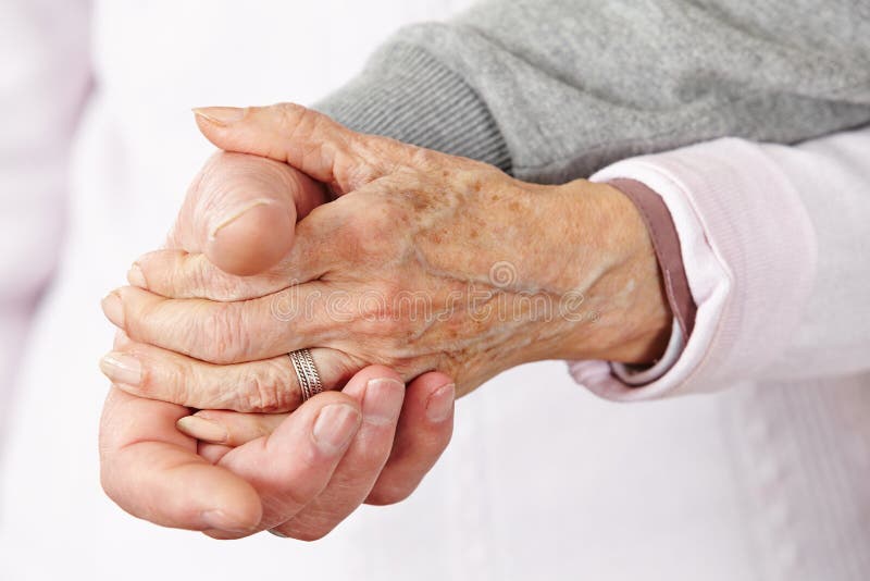 Two Senior Citizens Holding Hands Stock Photo - Image of hands ...