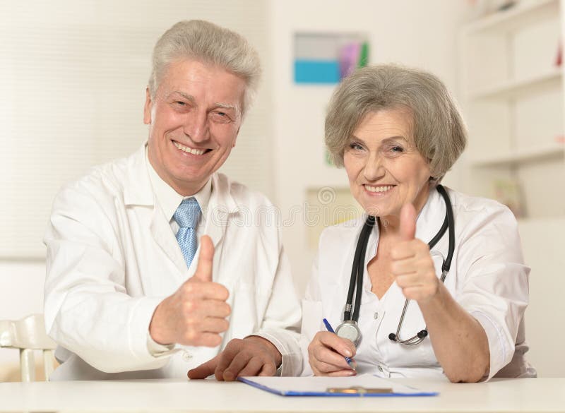 Two senior doctors stock image. Image of healthcare, portrait - 67825129