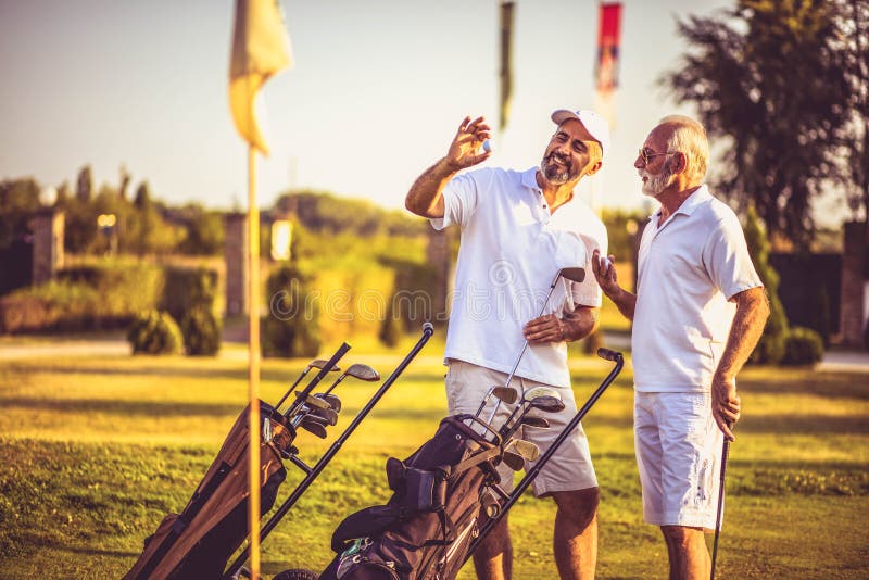 Two Senior Man on Golf Court Talking Stock Photo - Image of lifestyle ...