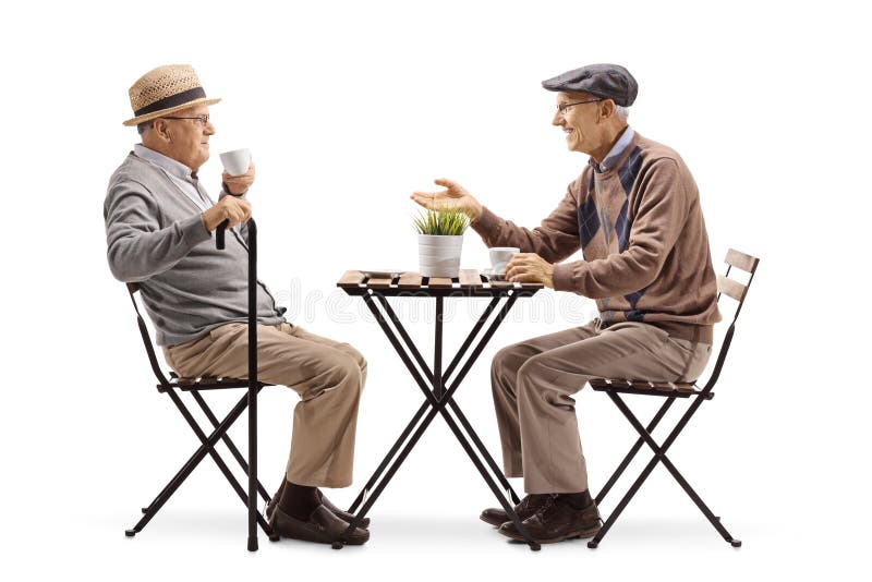 Two Senior Men Sitting at a Coffee Table and Talking Stock Image ...