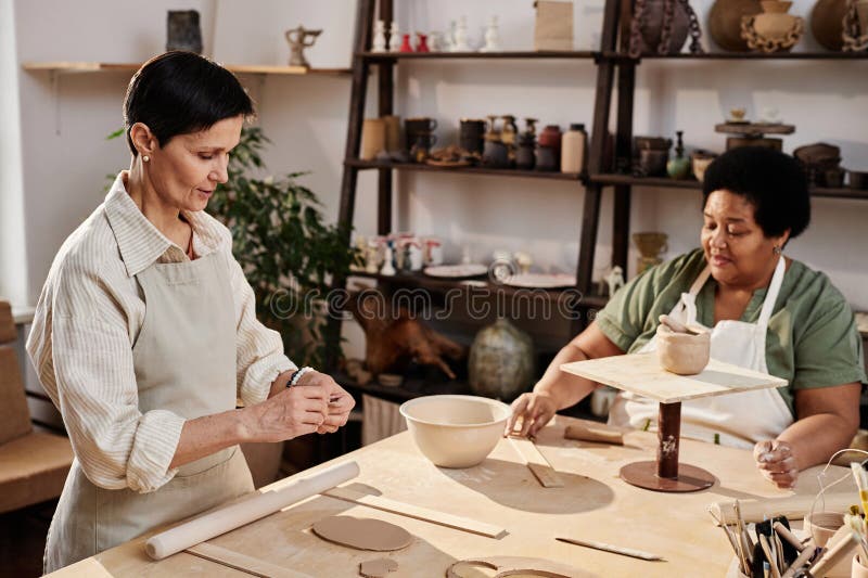 Two Senior Women in Pottery Class Stock Image - Image of artist, mature ...
