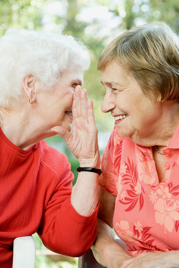 Two Senior Women Sharing a Secret Stock Image - Image of lonely ...