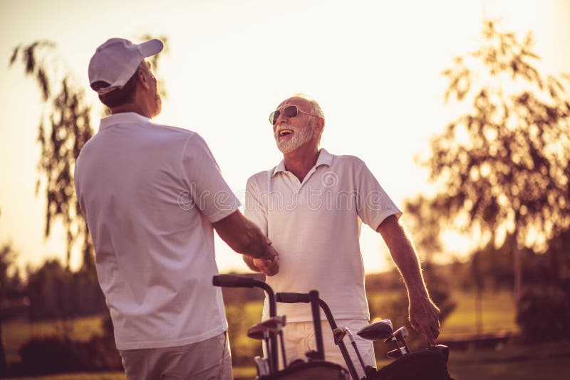 Golfers on Golf Course in Hug Stock Image - Image of female, adult ...