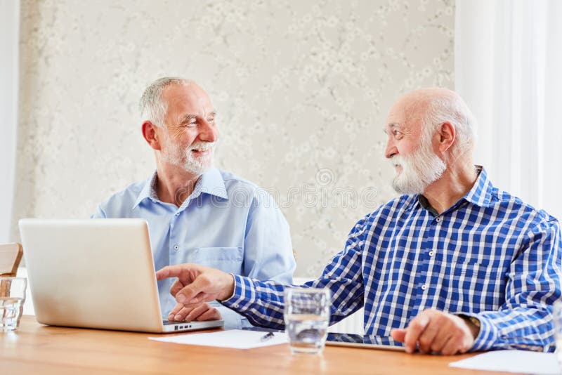 Two Seniors at the Laptop Computer are Having Fun Stock Photo - Image ...