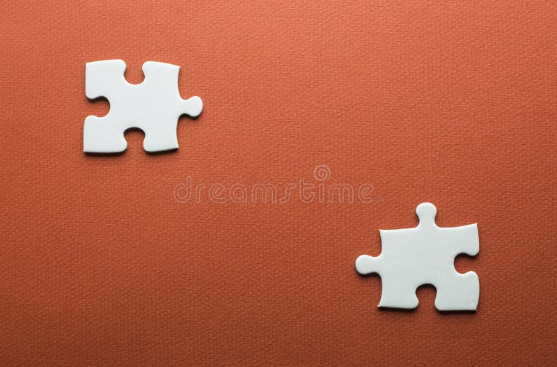 Two Separate Puzzle Pieces on an Orange Background Stock Image - Image ...