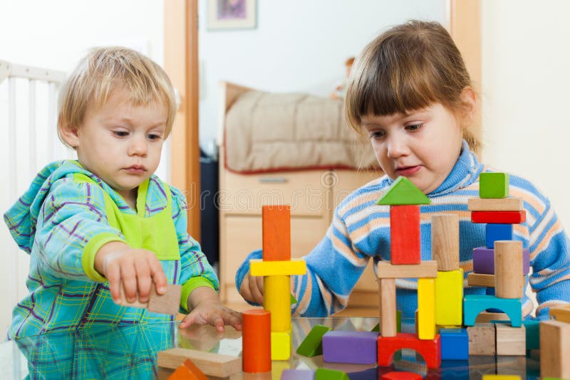 Two Serious Children in Home Stock Image - Image of composed, play ...