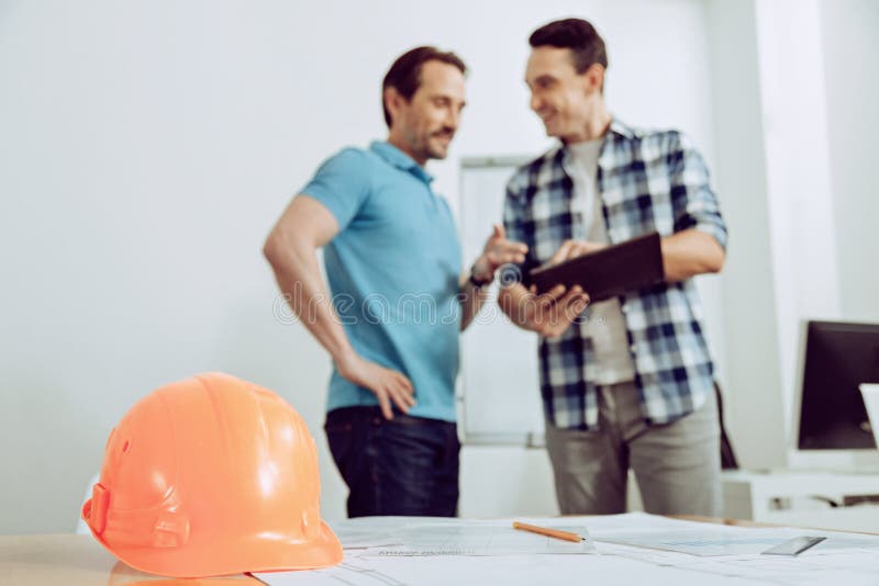 Two Serious Engineers Talking about Work Stock Image - Image of ...