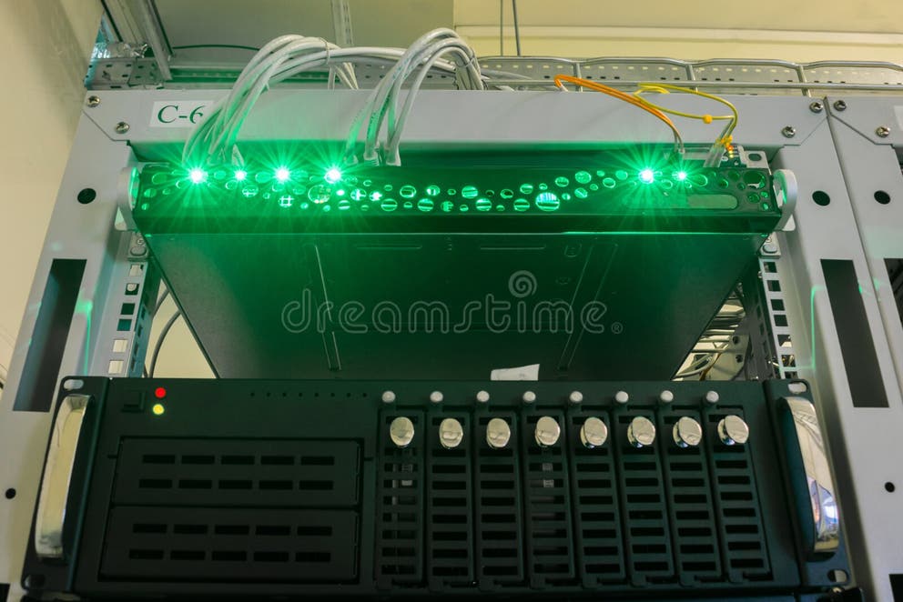 Two Servers are Installed in a Rack in the Server Room. the Green ...