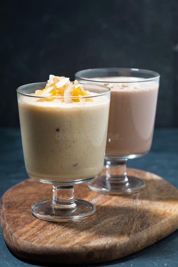 Two Servings of Milkshake in Glasses, Vertical Stock Image - Image of ...