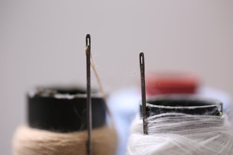 Two Sewing Needles and Three Threads for Manual Sewing Stock Photo ...