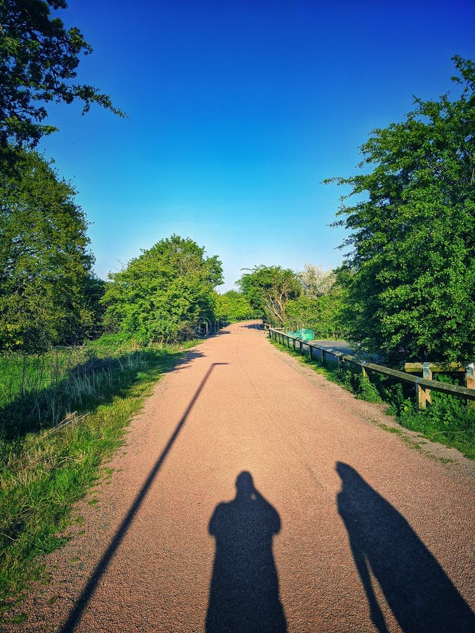 Two shadows of people stock photo. Image of nature, rural - 181247340