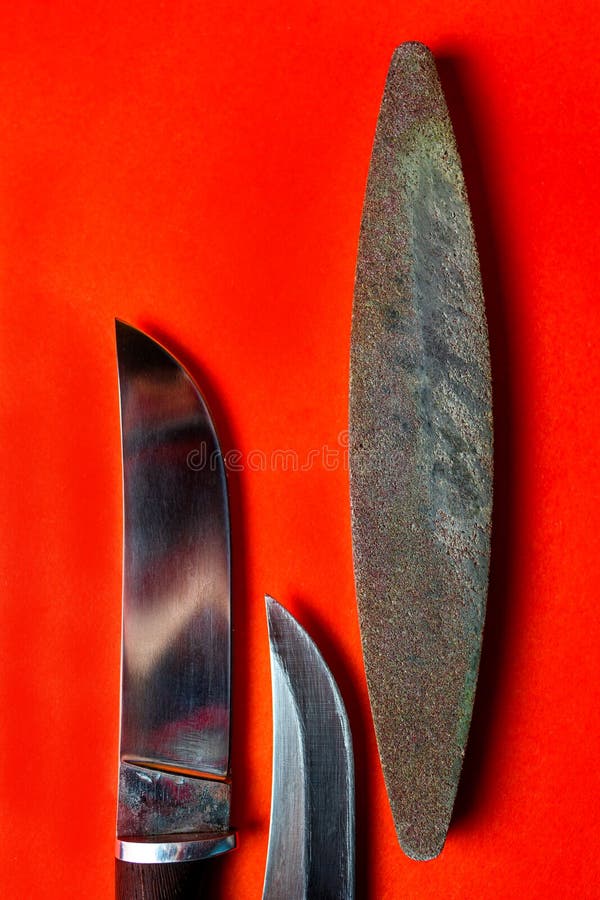 Two Sharp Knives on a Red Background Stock Photo - Image of steel ...