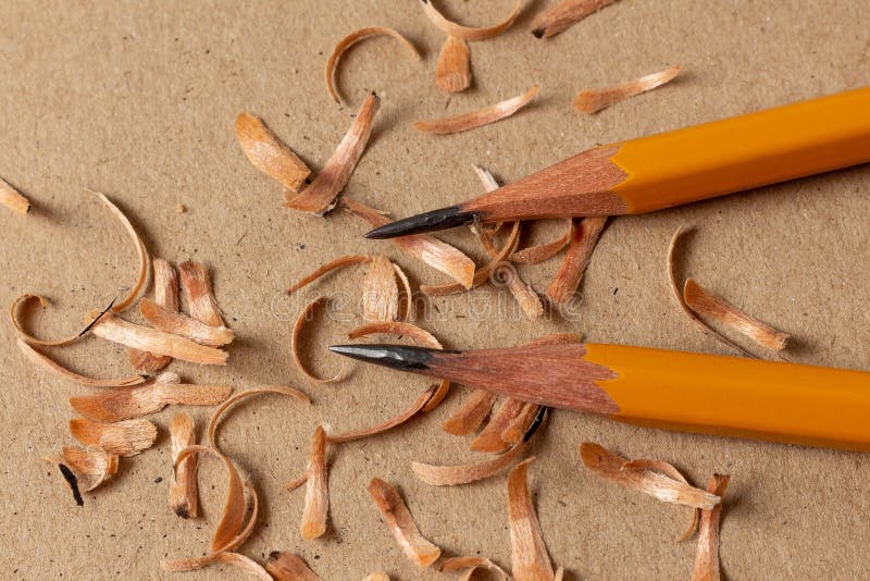 Two Professional Sharpened Wooden Pencils on a Cardboard Sheet Stock ...