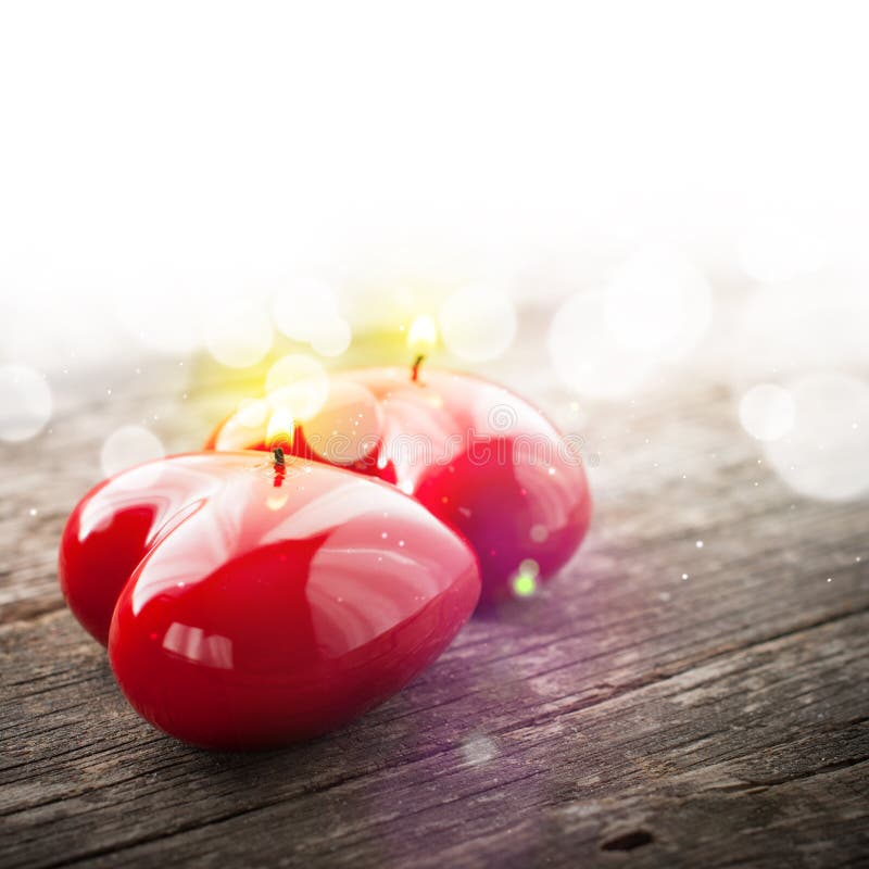 Two Shining Red Candles stock image. Image of harmony - 37487571