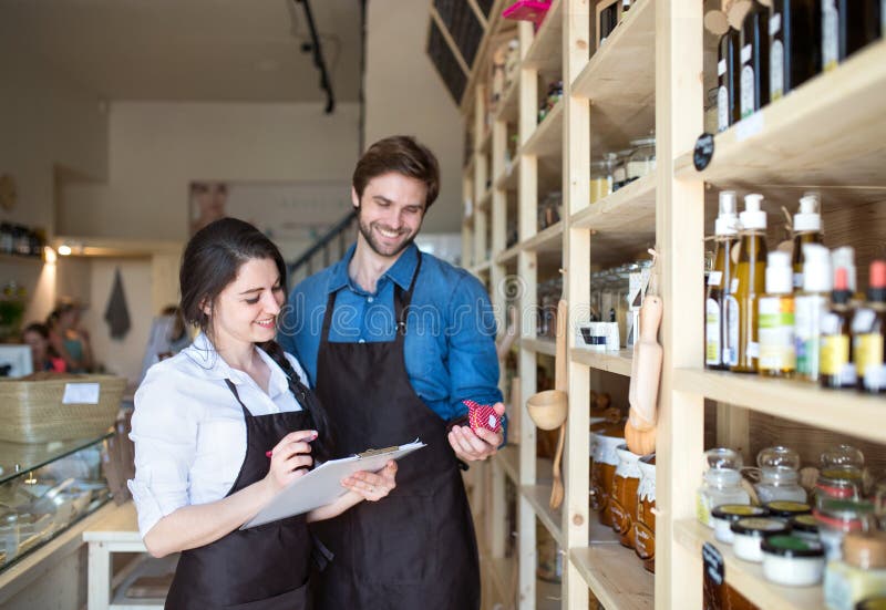 Two Shop Assistants in Package-free Store Using Reusable Containers ...