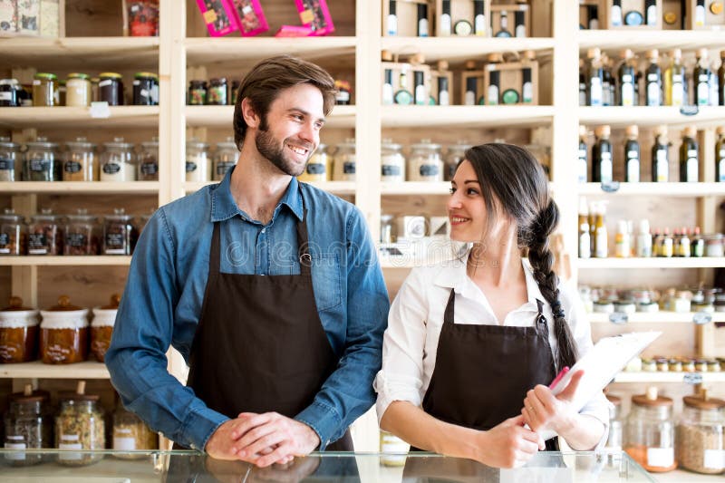 Two Shop Assistants in Package-free Store Using Reusable Containers ...