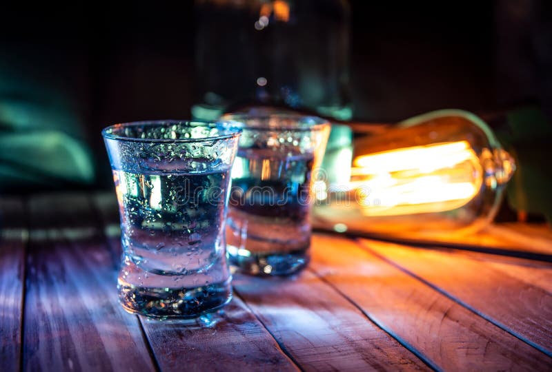 Two Shots of Vodka in the Multiple Bar Lights, Close-up Stock Image ...