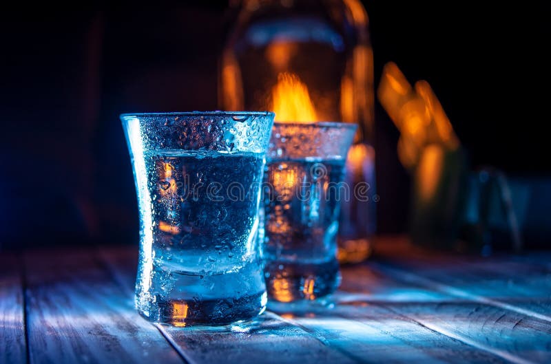 Two Shots of Vodka in the Multiple Bar Lights, Close-up Stock Photo ...