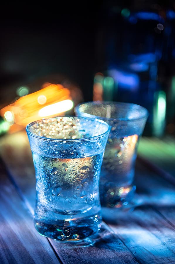 Two Shots of Vodka in the Multiple Bar Lights, Close-up Stock Image ...