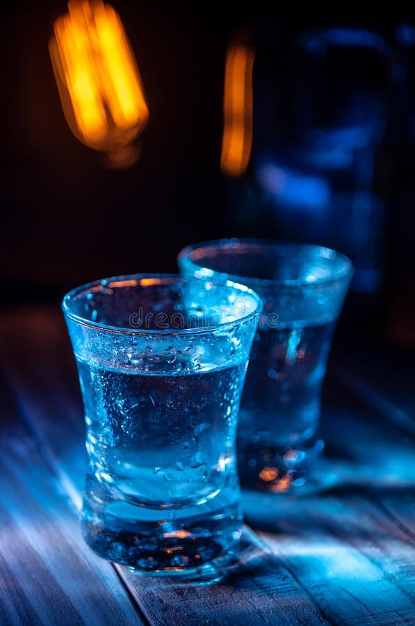 Two Shots of Vodka in the Multiple Bar Lights, Close-up Stock Image ...