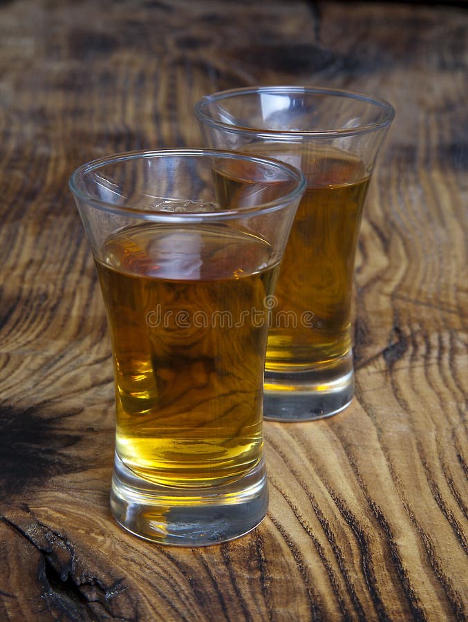 Two Shots of Whiskey stock photo. Image of full, table - 26631042