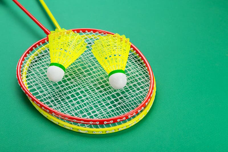 Two Shuttlecock for Badminton on a Green Background, Top View Stock ...