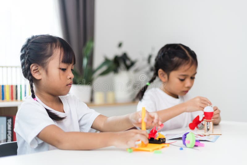 Two Sibling Asian Girl Playing Windmill Stacks Stock Photo - Image of ...