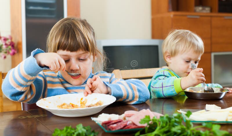 Two Siblings Eating Food Together Stock Photo - Image of person, alone ...