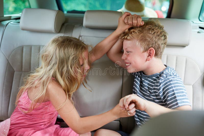 Kids Fighting Back Seat Stock Photos - Free & Royalty-Free Stock Photos ...